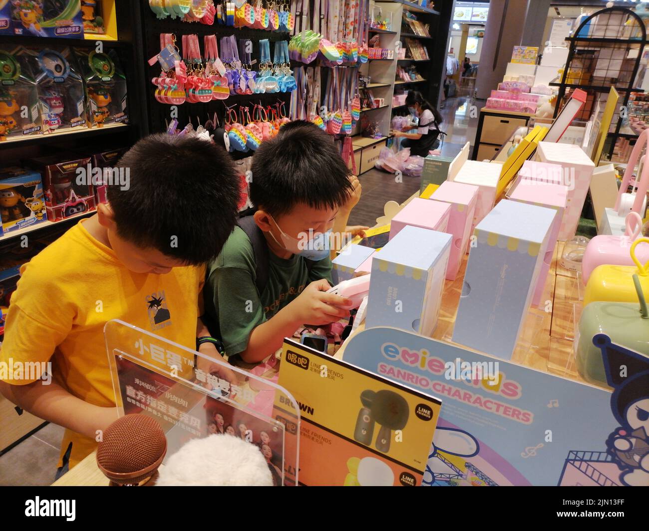 The children's toy mall has a lot of children playing here during the ...