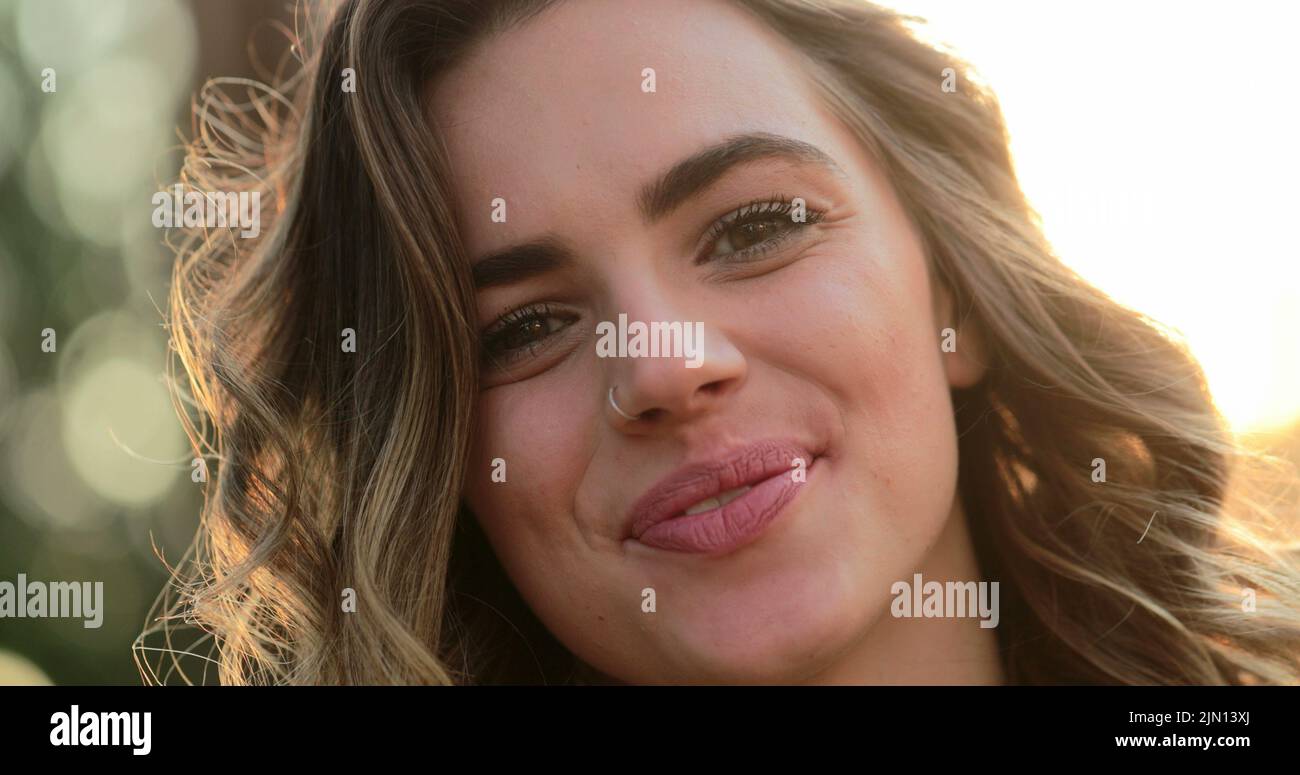 Hispanic latina girl smiling and laughing to camera. Portrait of young ...