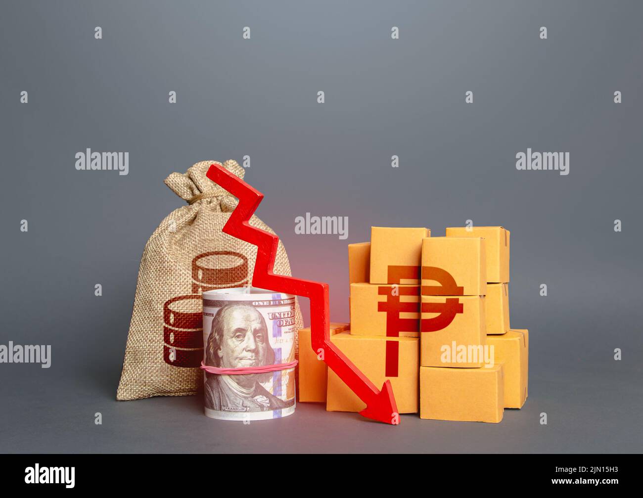 Philippine peso money with goods and an arrow down. Falling profits ...