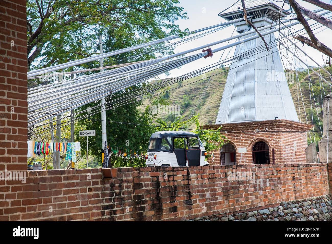 Traditional motorcycle at the entrance of the historical Bridge of the ...