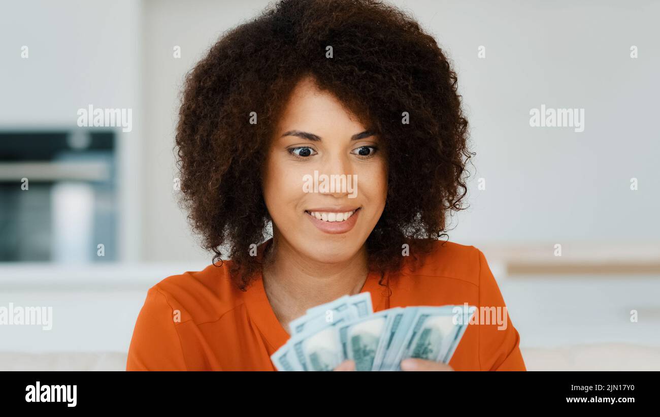 Smiling biracial woman pay hi-res stock photography and images - Alamy