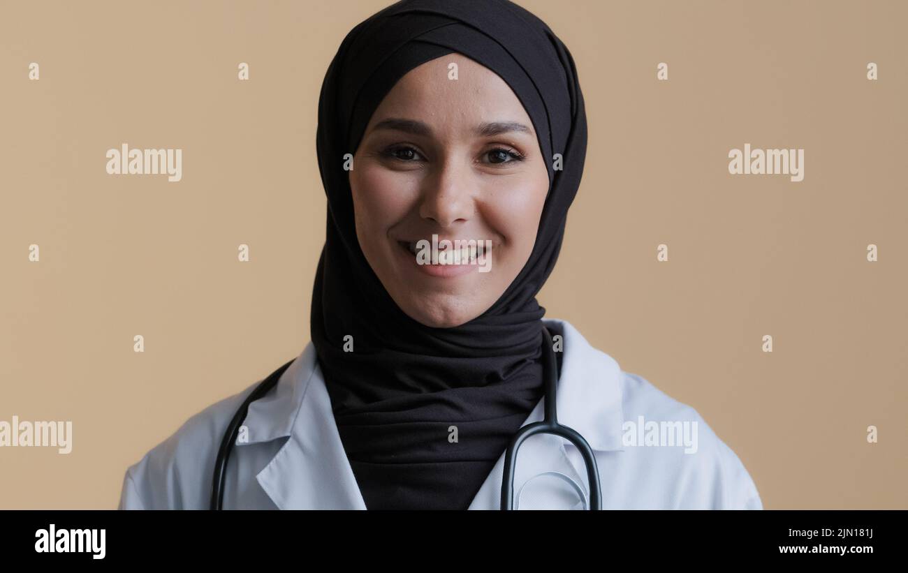 Young muslim professional woman female doctor physician in hijab white ...