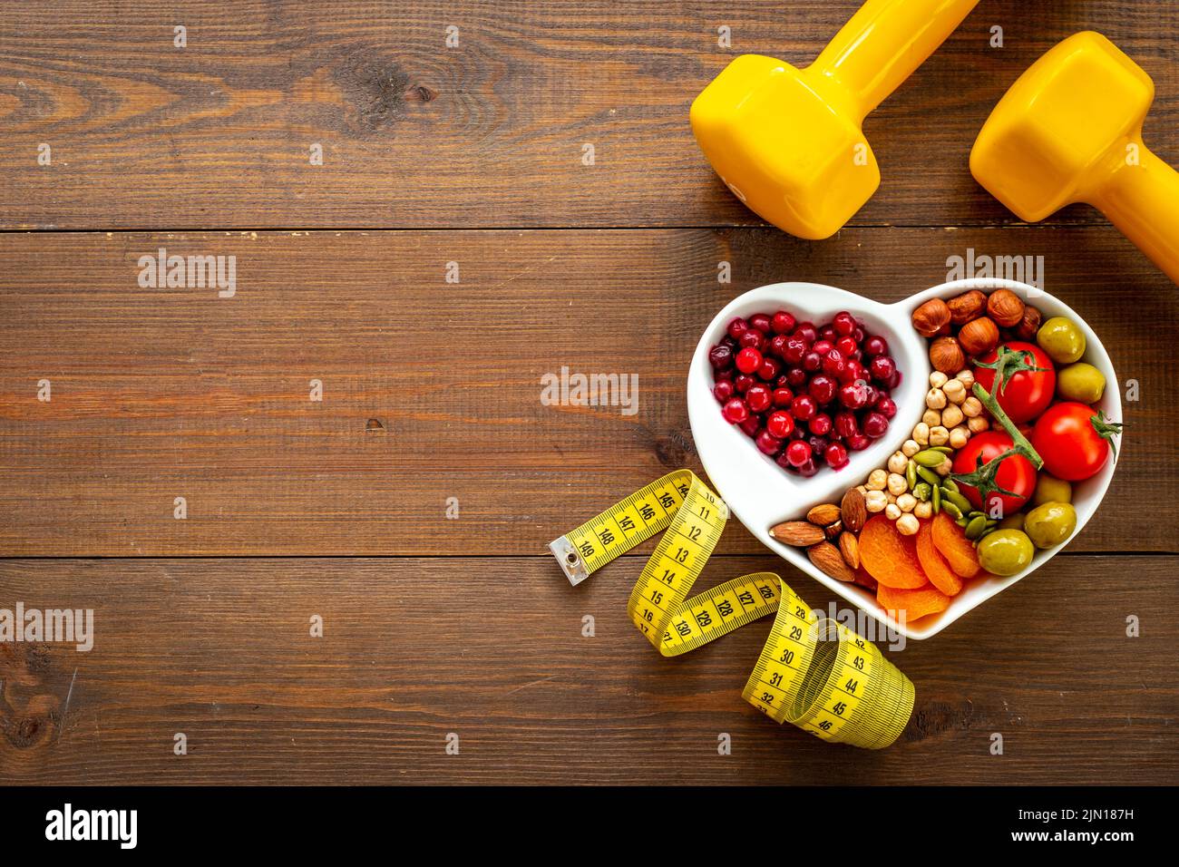 Healthy food in heart shaped dish. Healthy lifestyle and nutrition ...