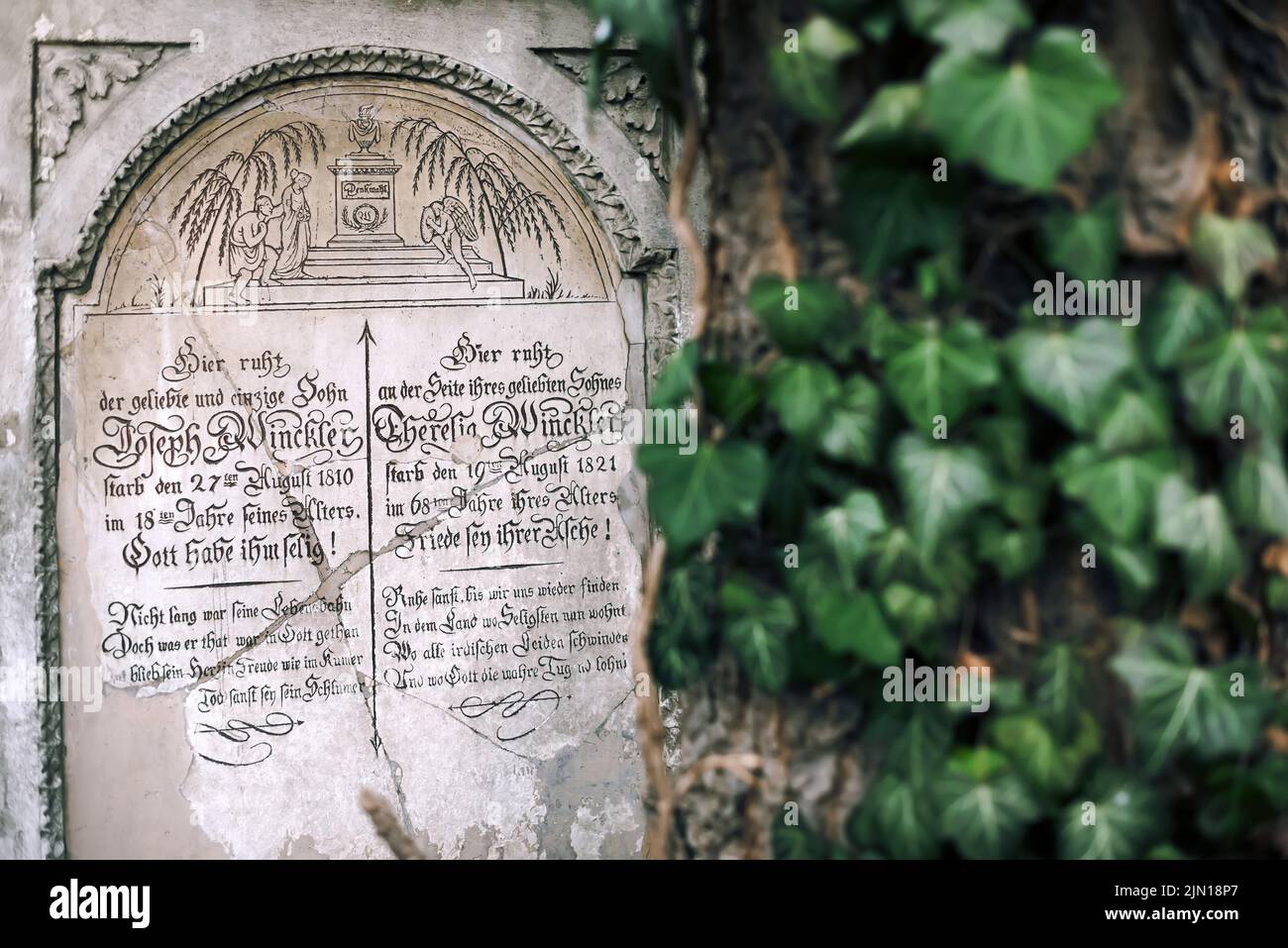 Grave with Gothic Inscription in Old European Graveyard Stock Photo - Alamy