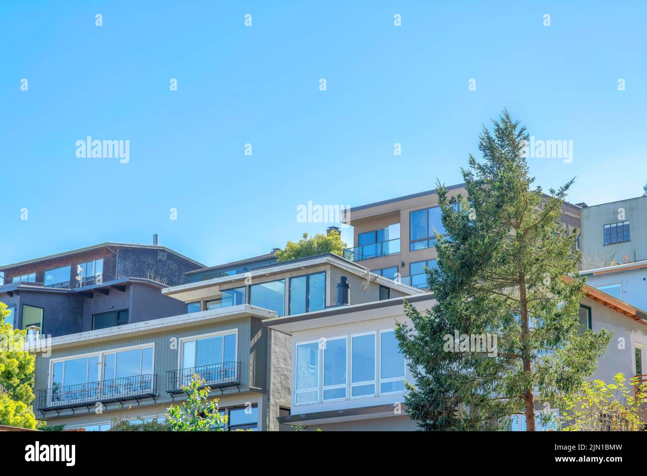 Facade of upper middle class residences in San Francisco, CA. Large ...
