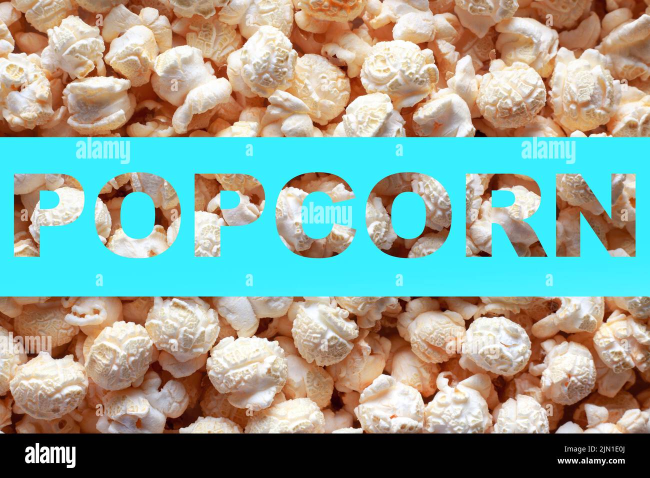 Popcorn texture background with inscription POPCORN. Word POPCORN on ...