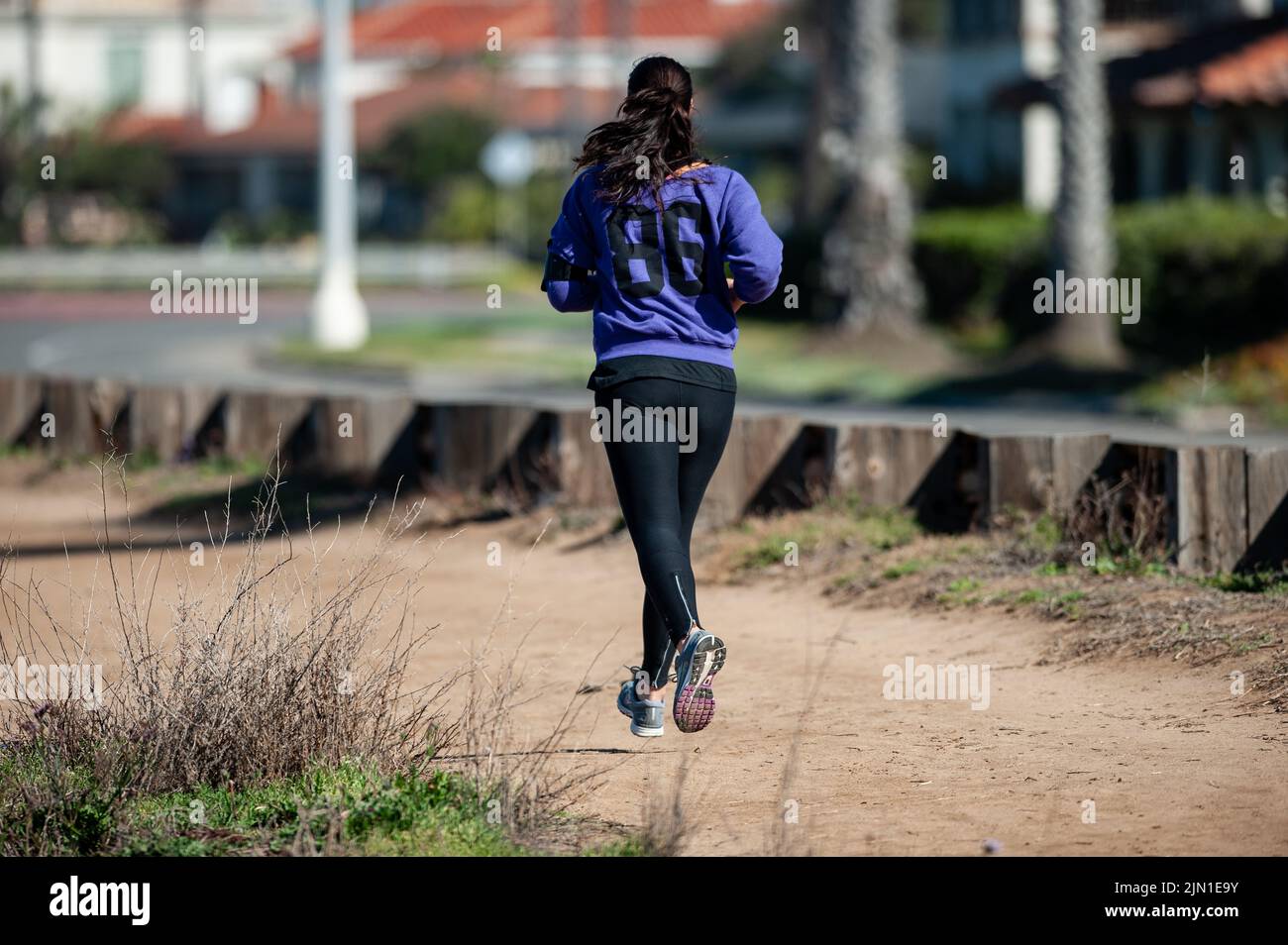 Stock image of a woman on her morning run. Trail Runner, Beach Runner ...