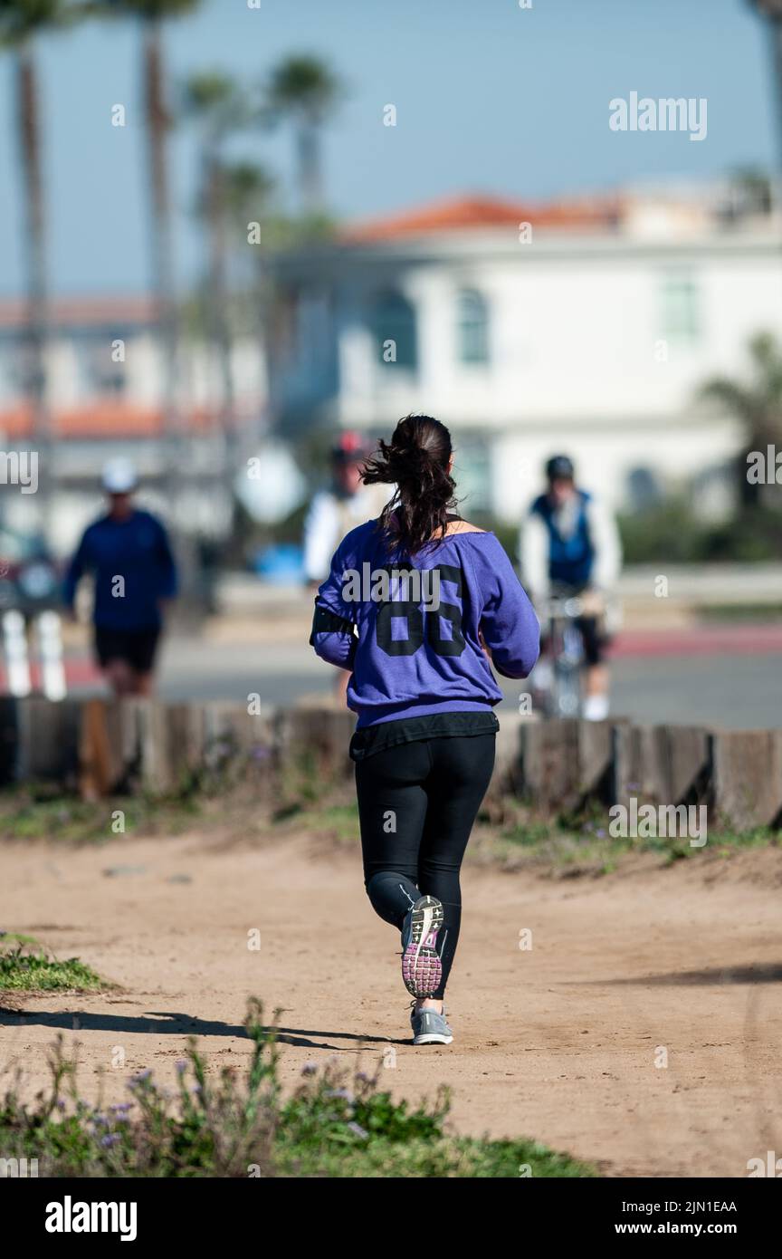 Stock image of a woman on her morning run. Trail Runner, Beach Runner ...