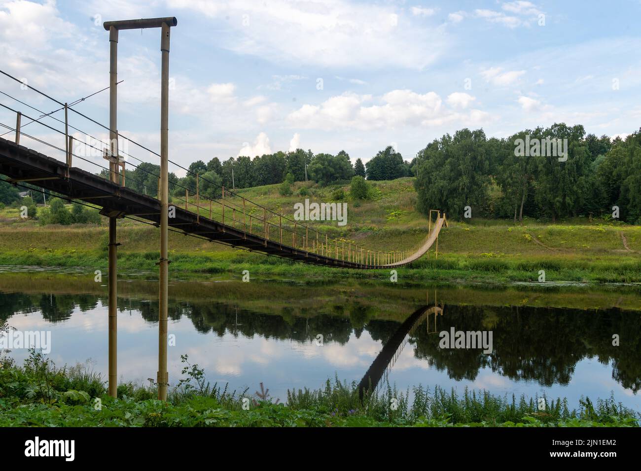 Moscow region. The suspension bridge through the Moskva River connects ...