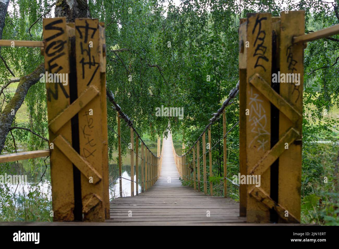 Moscow region. The suspension bridge through the Moskva River connects ...