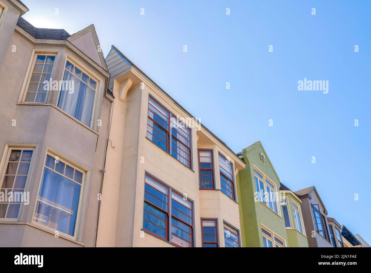 Adjacent houses with paned windows at San Francisco, California. Low ...