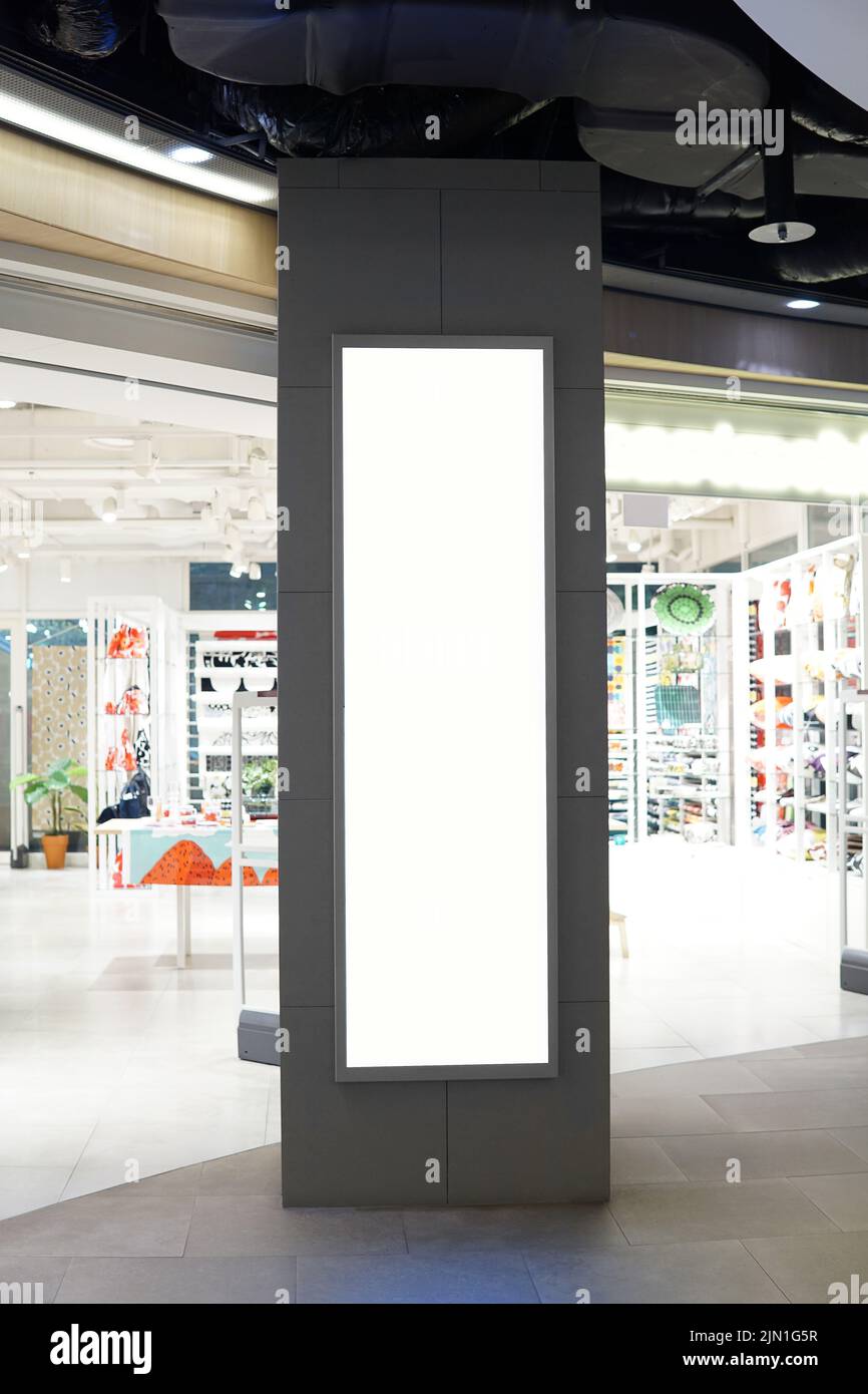 Advertising poster board inside department store Stock Photo - Alamy