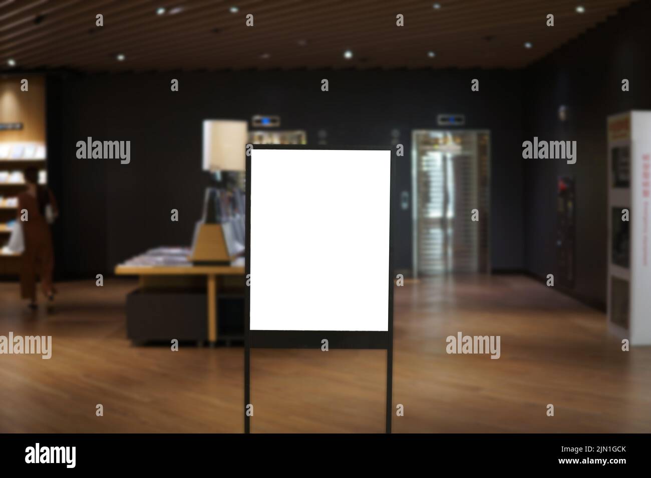 Advertising poster board inside department store Stock Photo - Alamy