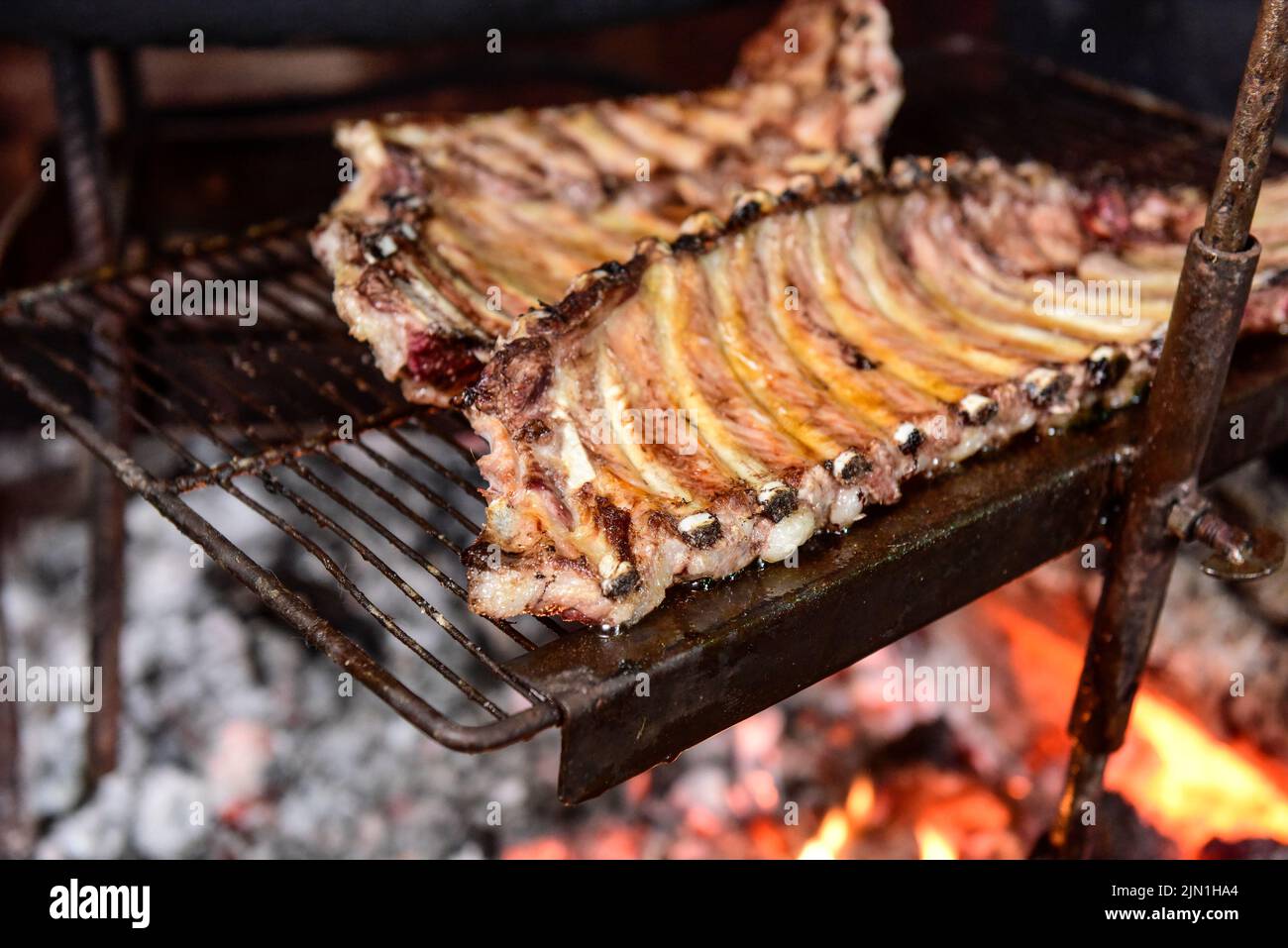 Roasted Crispy Ribs, traditional Argentinian barbecue Stock Photo - Alamy