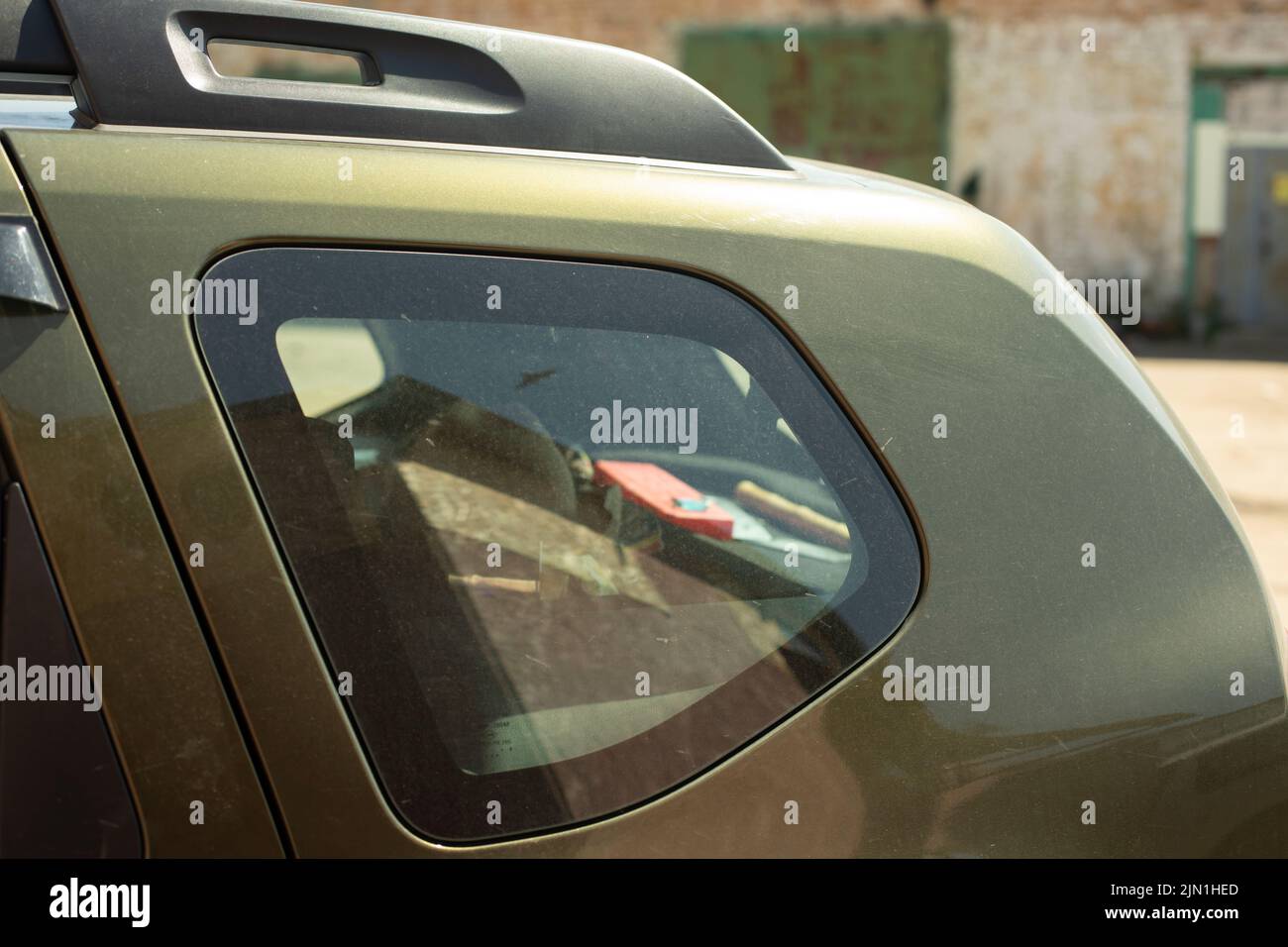 Rear side window of car. Small window in transport. Machine parts ...