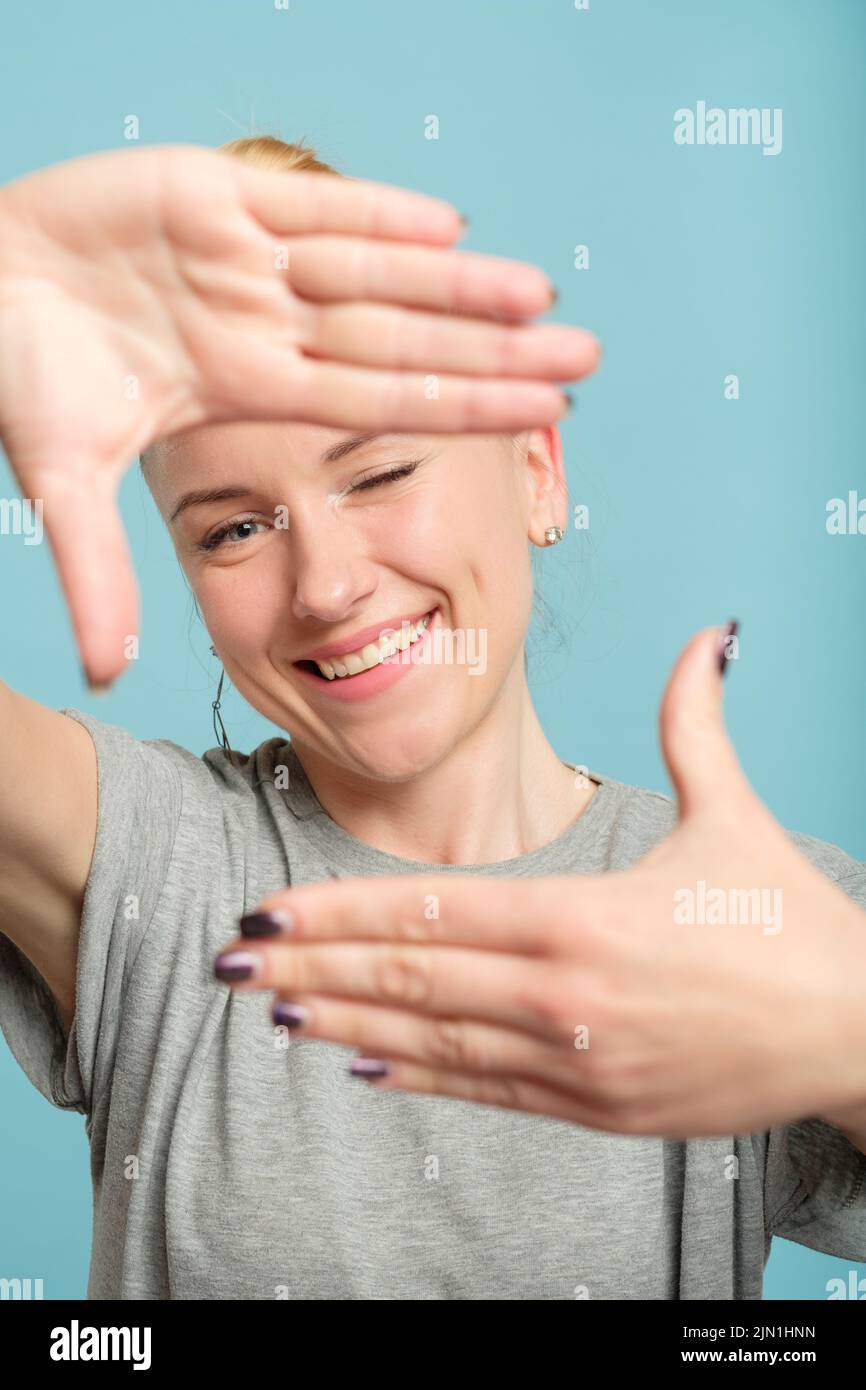 woman pretend take photo hands frame arts hobby Stock Photo - Alamy
