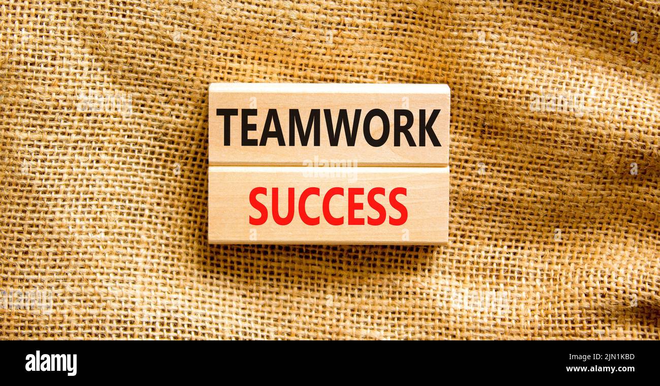Teamwork success symbol. Concept words Teamwork success on wooden ...