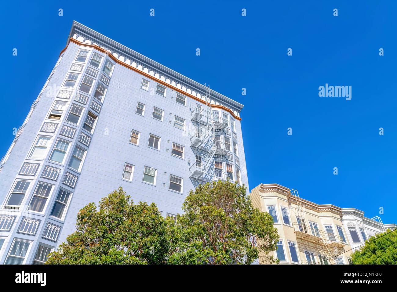 Mid-rise and low rise apartment buildings with emergency stairs at San ...