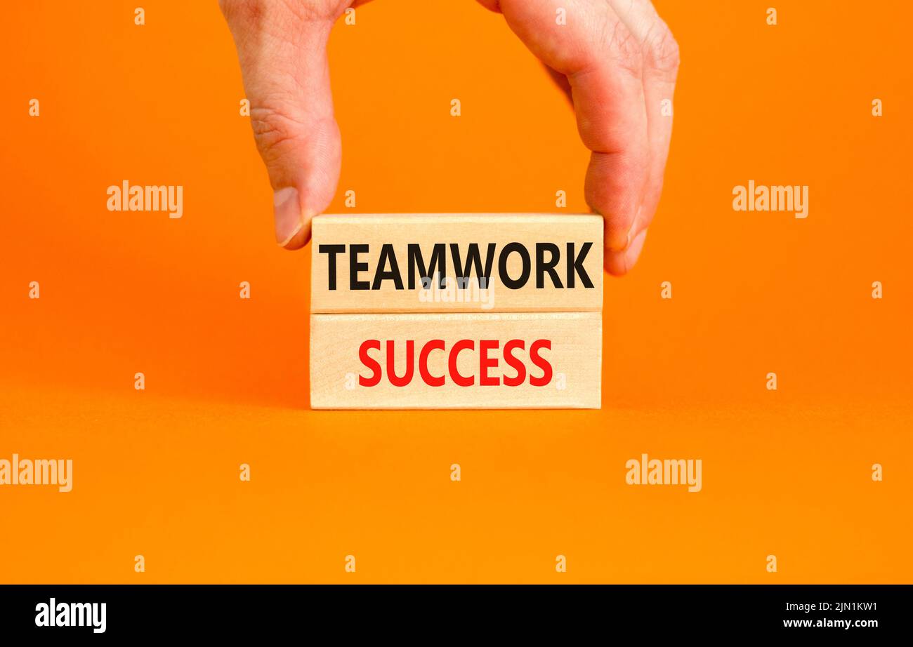 Teamwork success symbol. Concept words Teamwork success on wooden ...