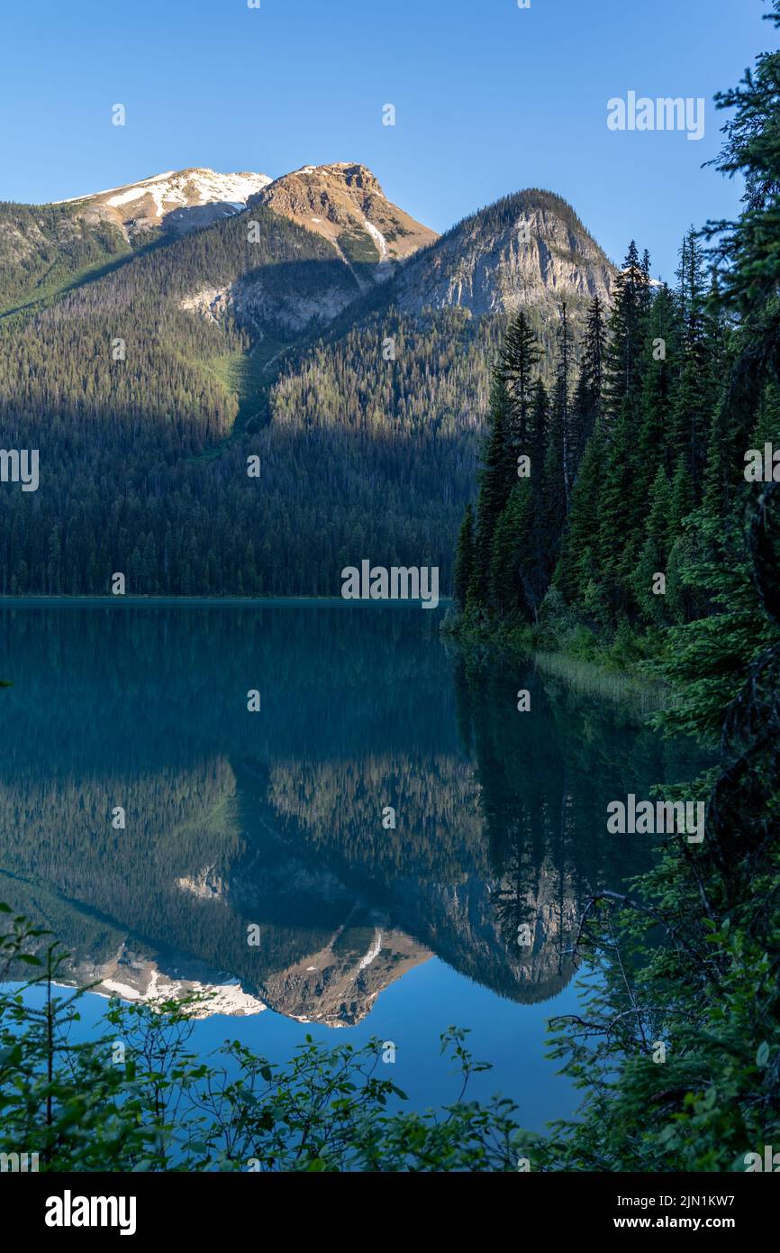 Sunrise on the calm water of Emerald Lake in Yoho National Park Canada ...