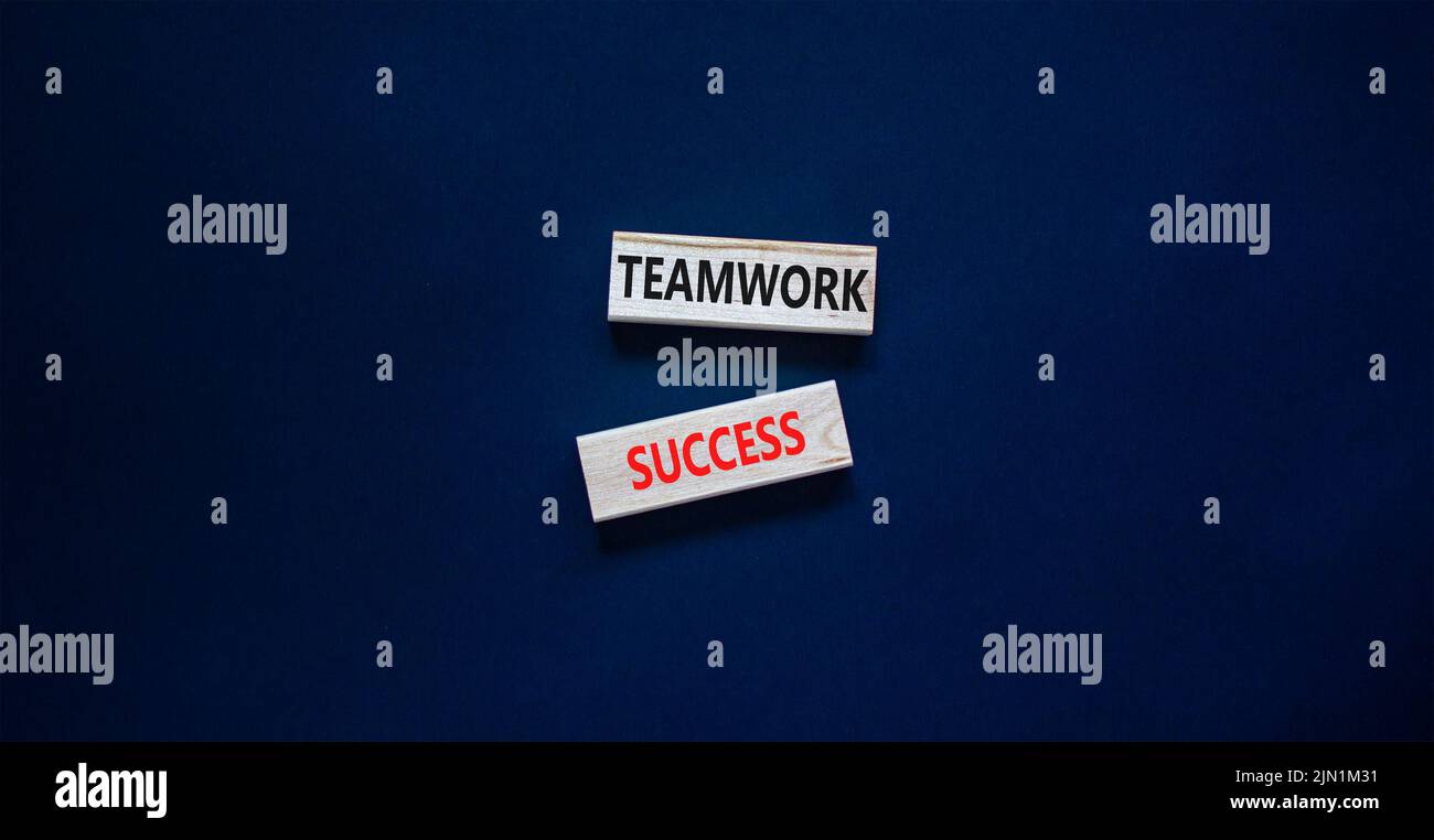 Teamwork success symbol. Concept words Teamwork success on wooden ...