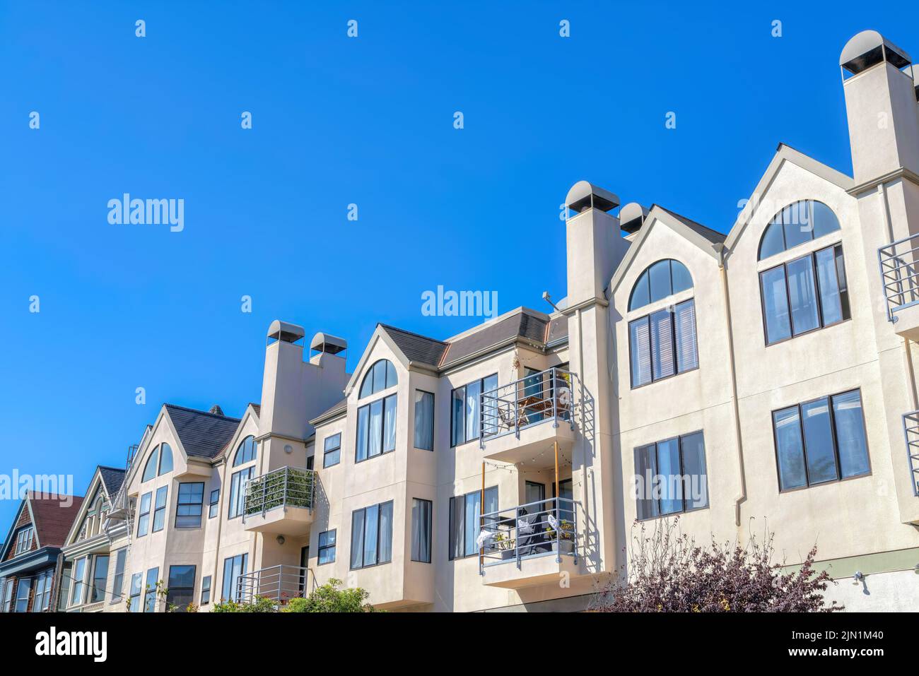 San Francisco houses in California with balconies against the sky. Row ...