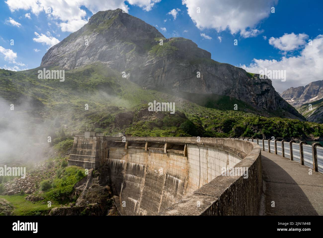 concrete dam across the barrage des gloriettes, a large reservoir and ...