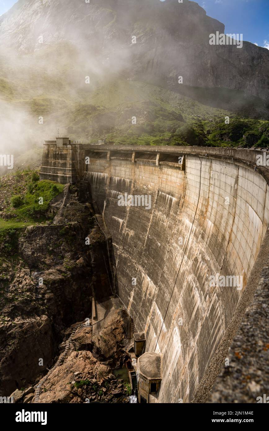 concrete dam across the barrage des gloriettes, a large reservoir and ...