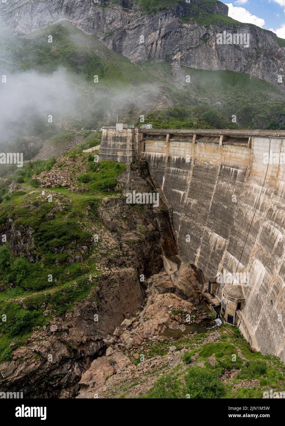 concrete dam across the barrage des gloriettes, a large reservoir and ...