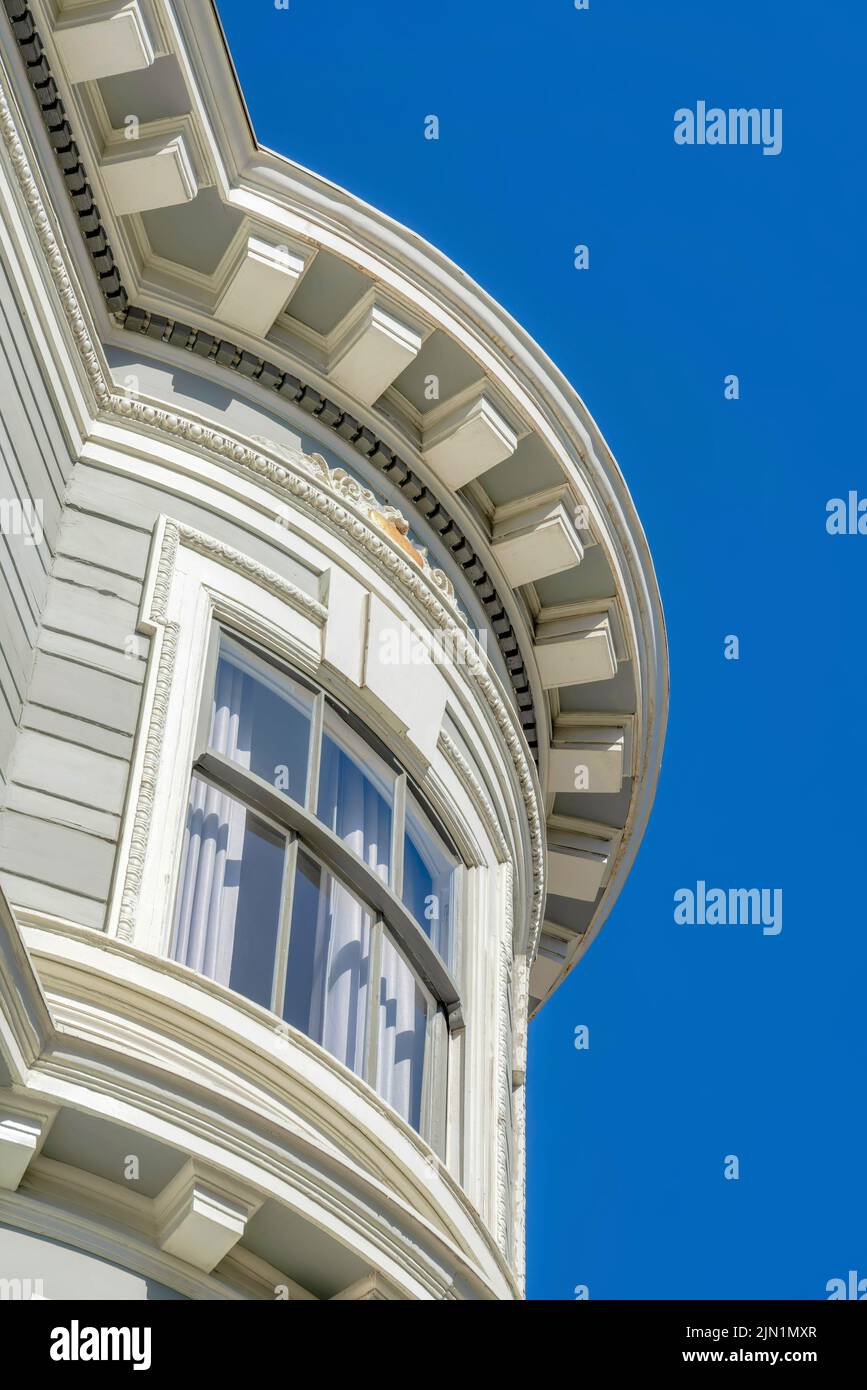 Curved window wall of a victorian style building in San Francisco ...
