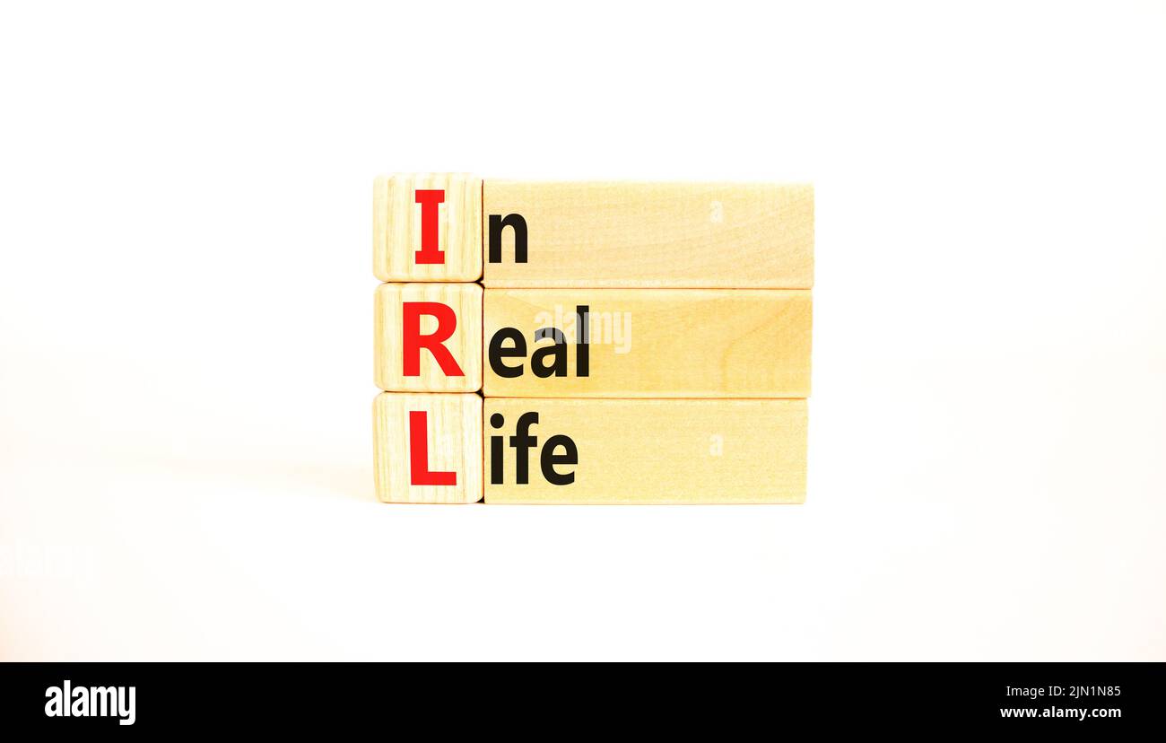 IRL in real life symbol. Concept words IRL in real life on wooden ...