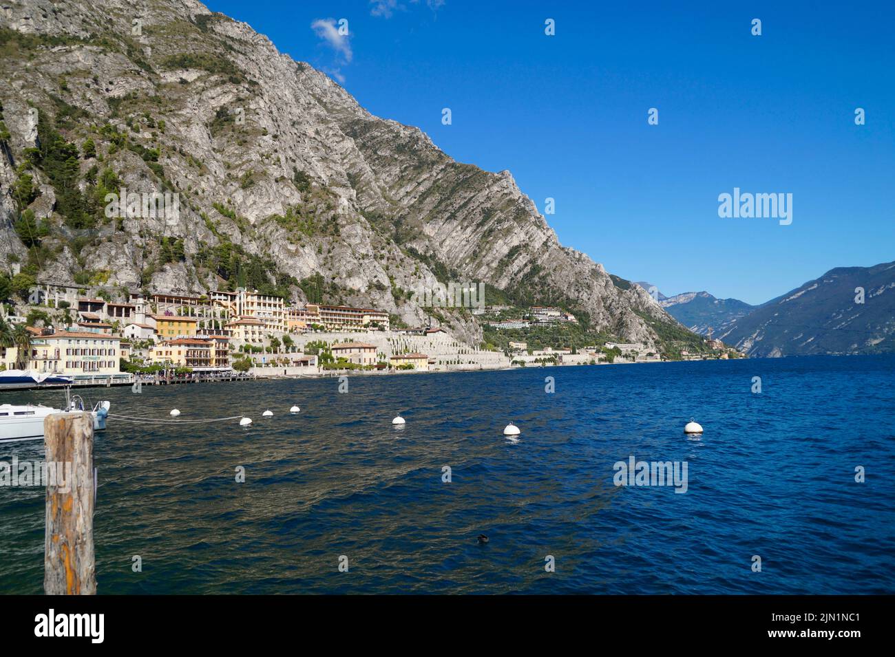 picturesque harbour of the Italian town of Limone sul Garda on ...