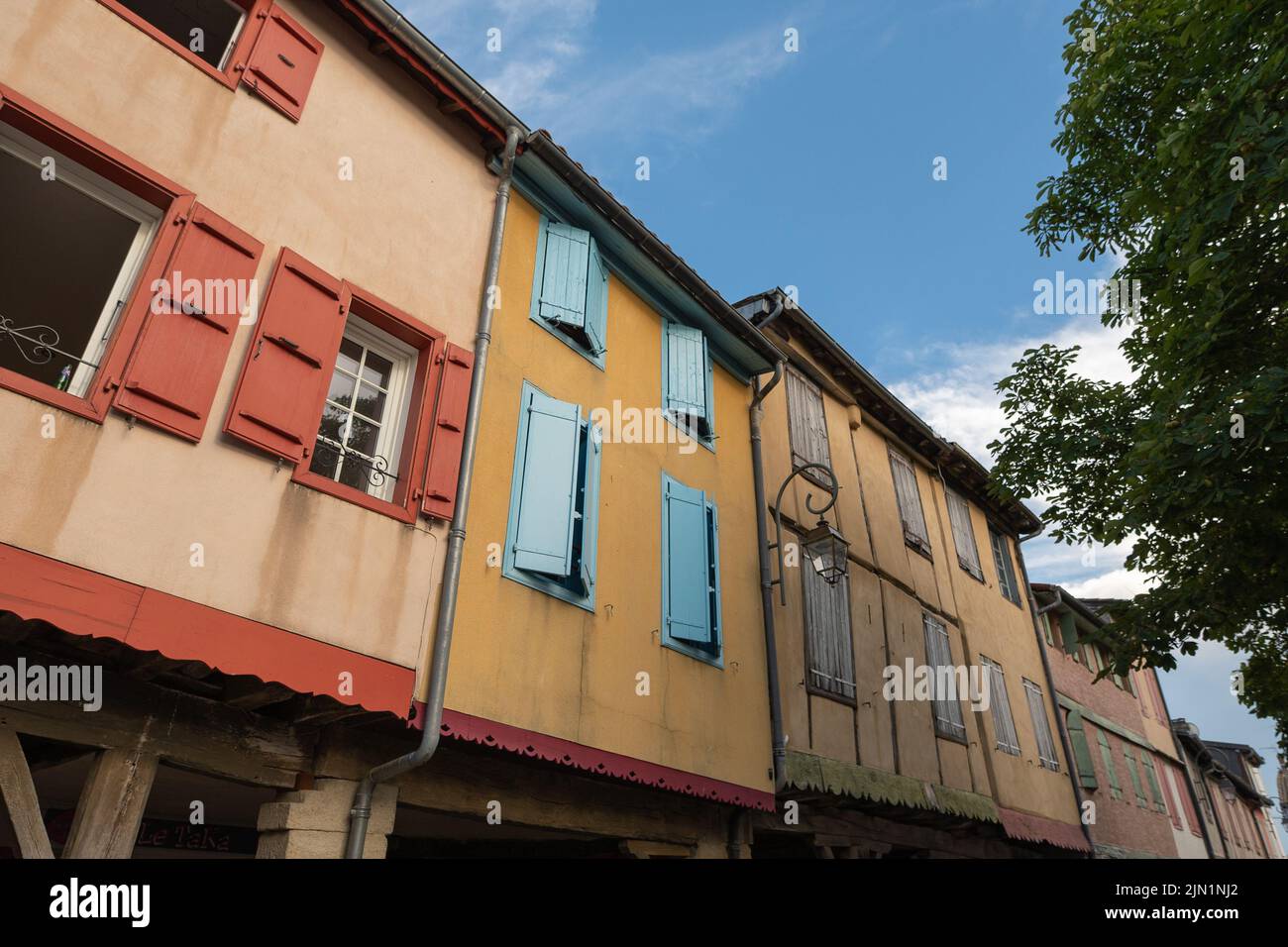 Old framework houses at main square of medieval village Mirepoix in ...