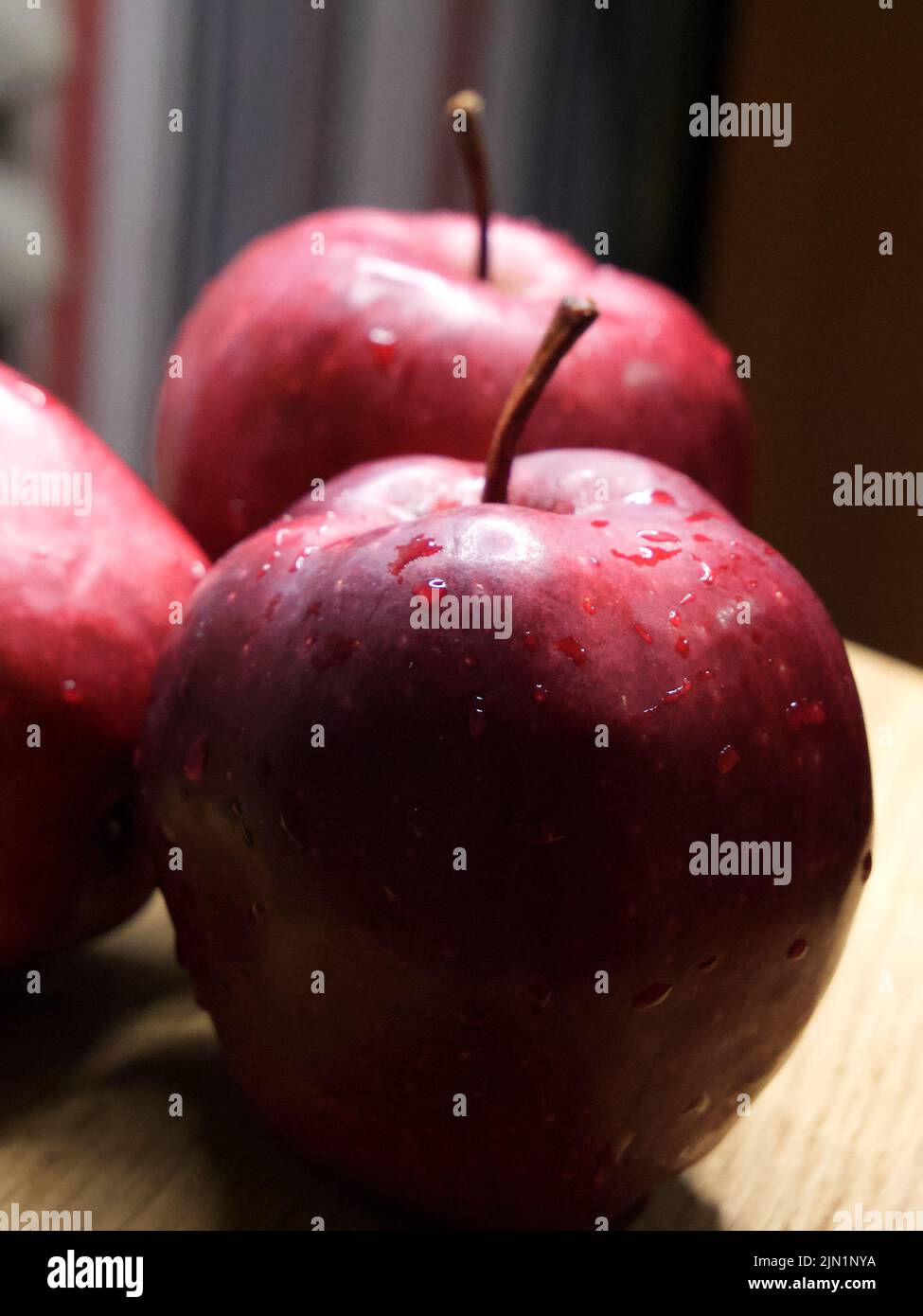 Big red apple. Close-up shot. Wet fruits Stock Photo - Alamy
