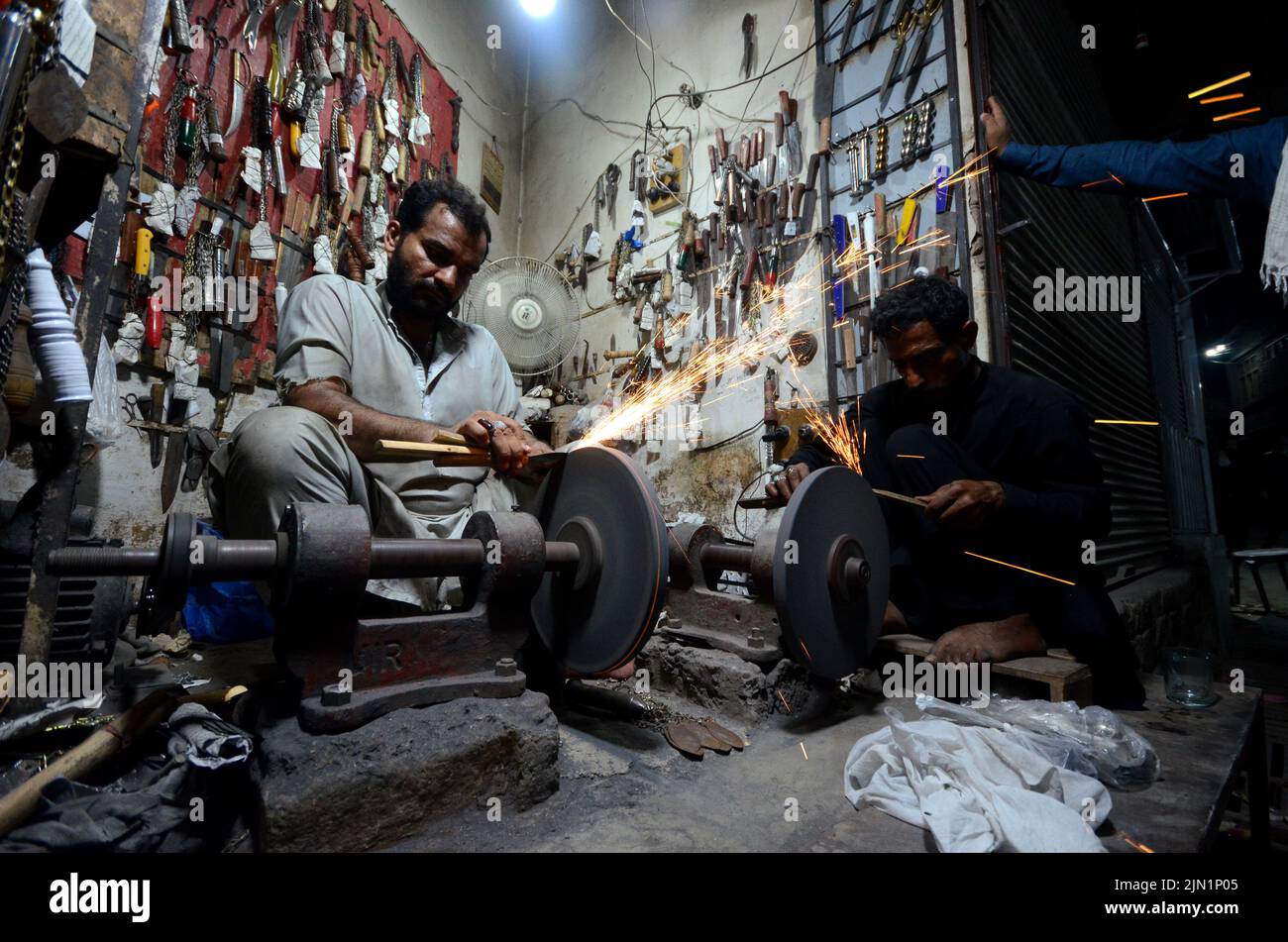 Peshawar, Khyber Pakhtunkhwa, Pakistan. 7th Aug, 2022. An ironsmith ...
