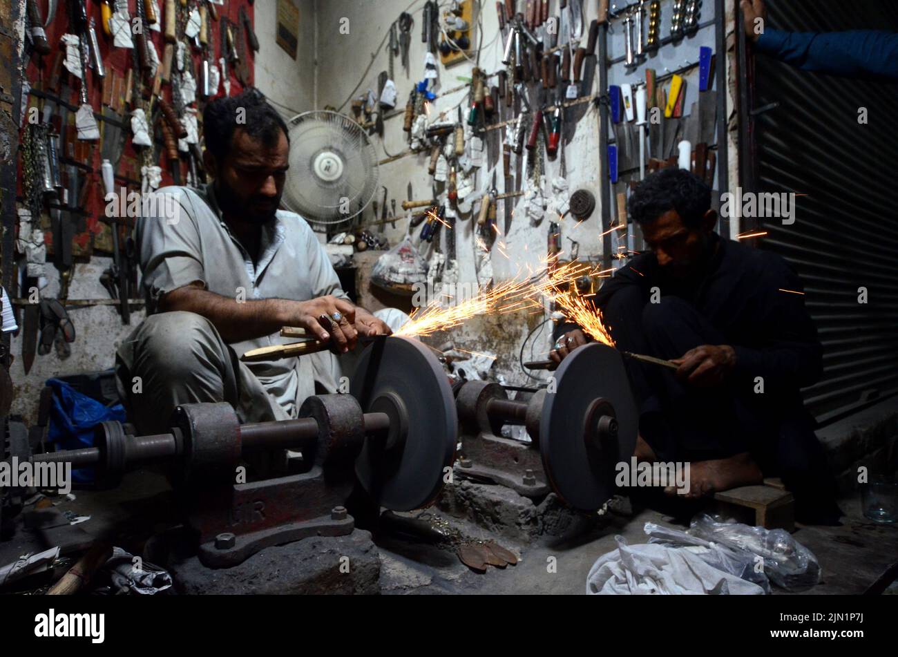Peshawar, Khyber Pakhtunkhwa, Pakistan. 7th Aug, 2022. An ironsmith ...