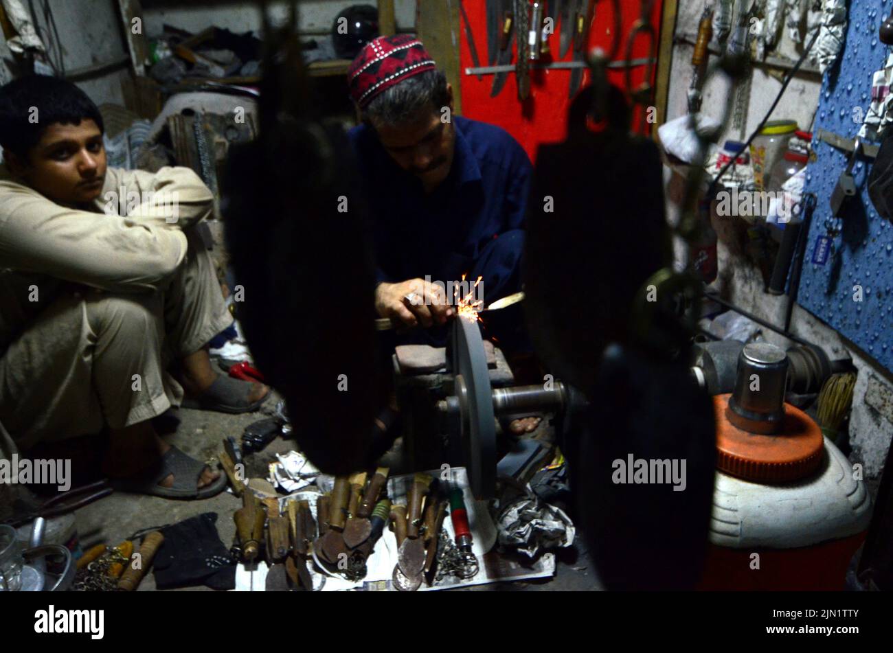 Peshawar, Khyber Pakhtunkhwa, Pakistan. 7th Aug, 2022. An ironsmith ...