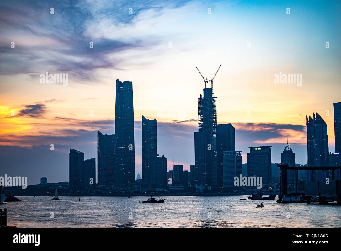 Beautiful harbour city scenery at night Stock Photo - Alamy