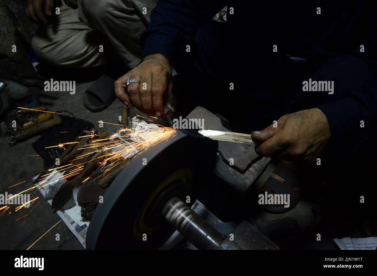 Peshawar, Khyber Pakhtunkhwa, Pakistan. 7th Aug, 2022. An ironsmith ...