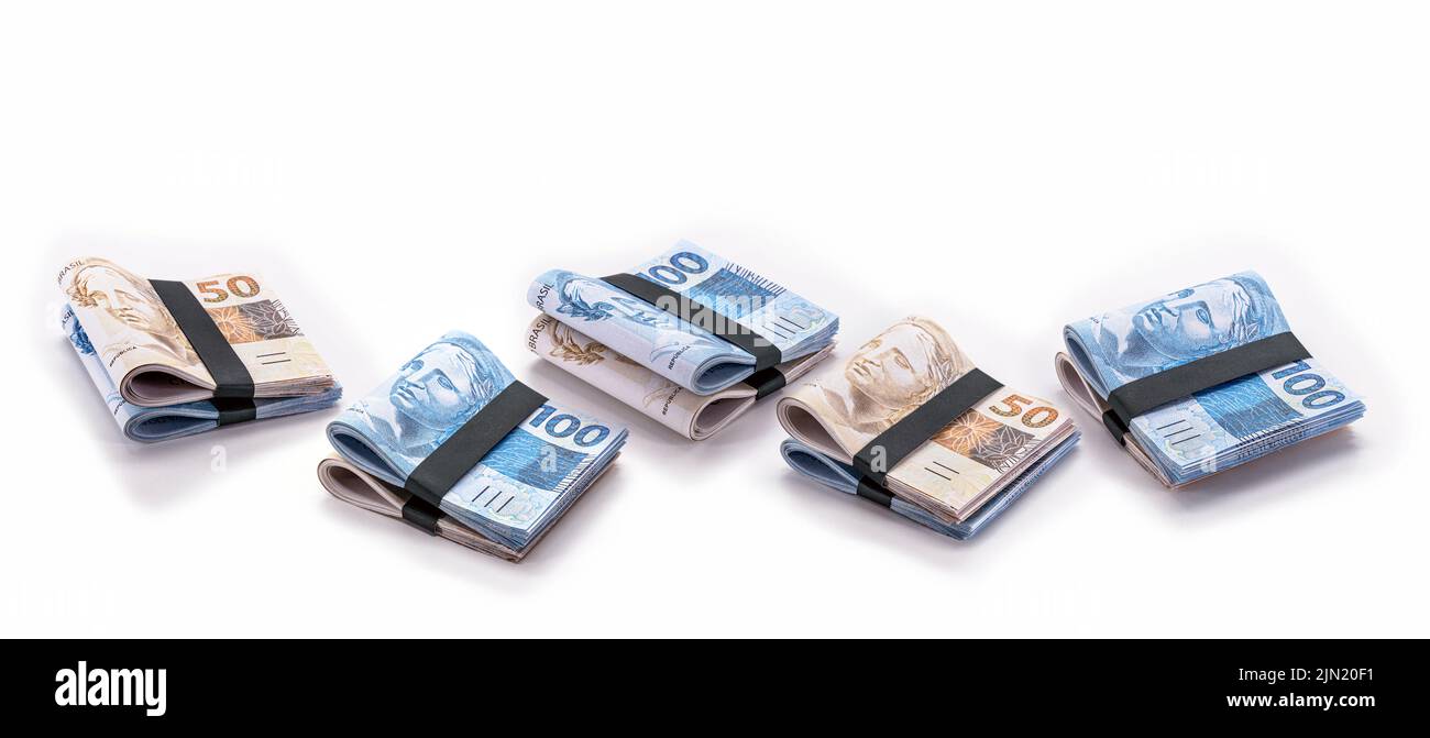 Brazilian real notes, 100 and 50 reais, ten thousand reais, millionaire ...