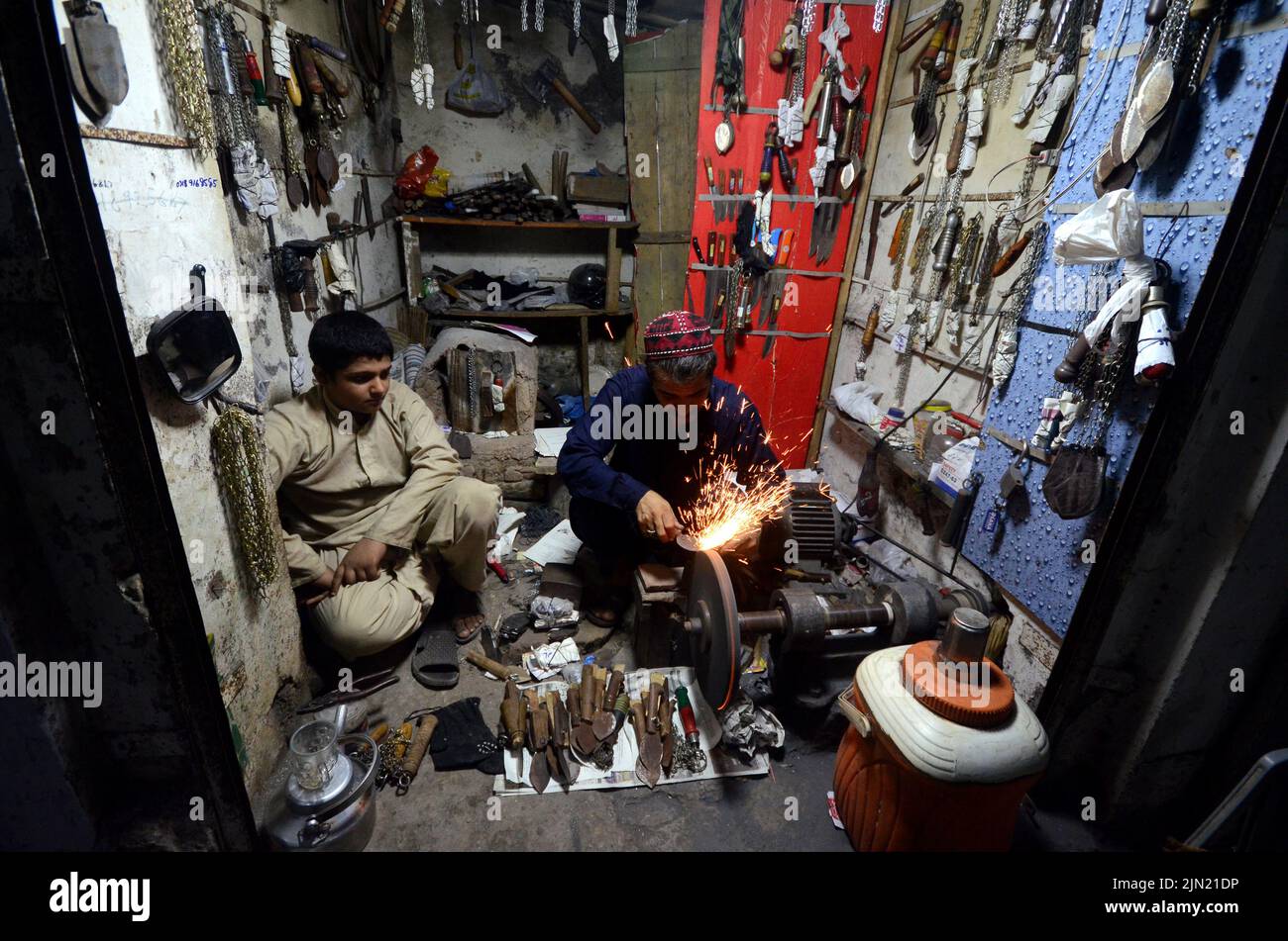 Peshawar, Khyber Pakhtunkhwa, Pakistan. 7th Aug, 2022. An ironsmith ...