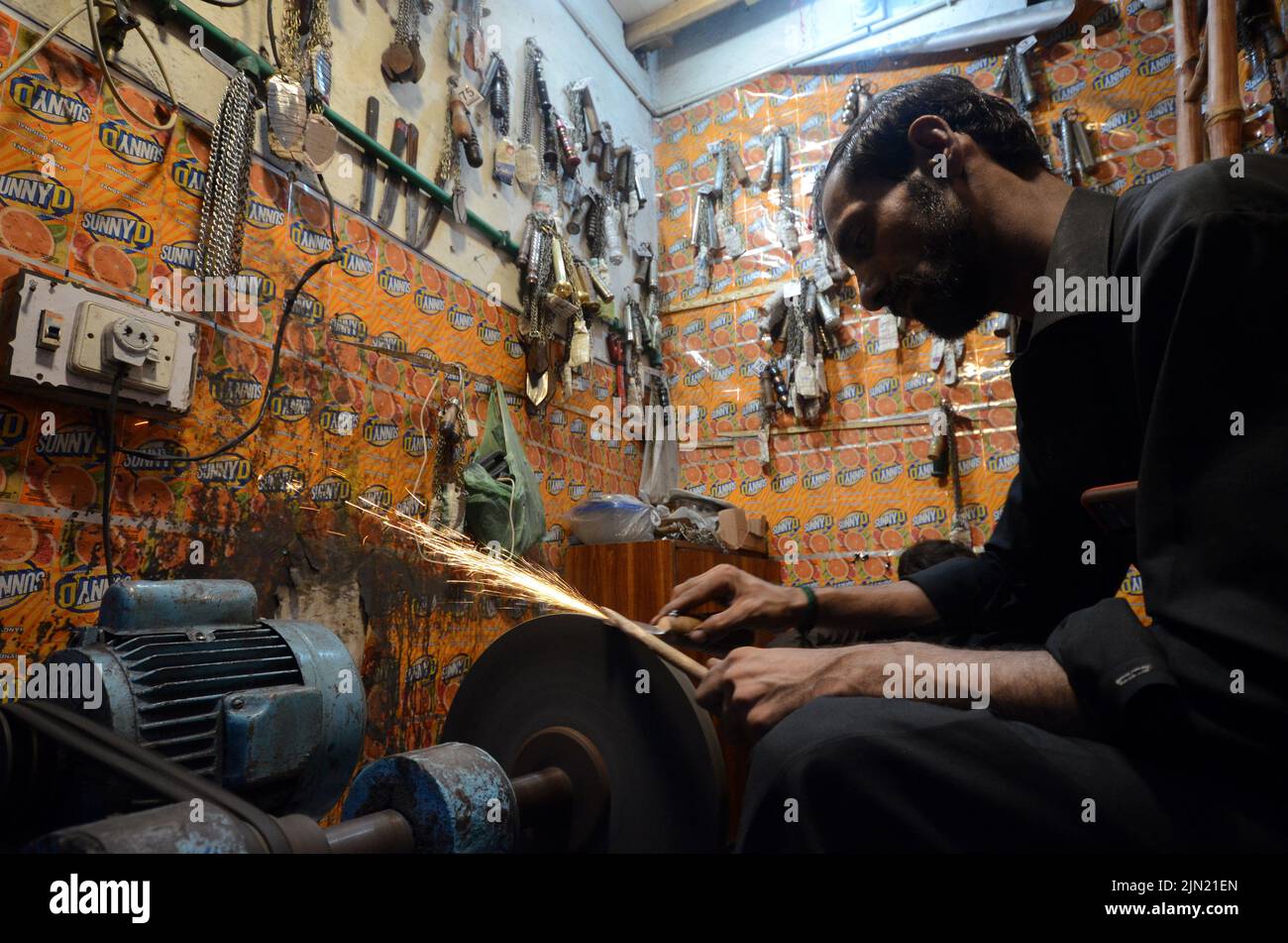Peshawar, Khyber Pakhtunkhwa, Pakistan. 7th Aug, 2022. An ironsmith ...