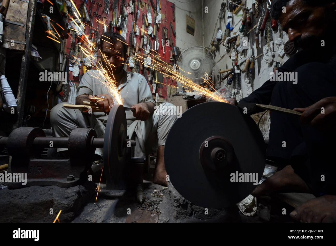 Peshawar, Khyber Pakhtunkhwa, Pakistan. 7th Aug, 2022. An ironsmith ...