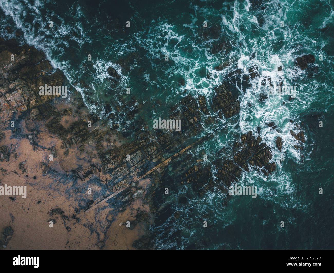 An aerial view of sea waves breaking beach Stock Photo - Alamy