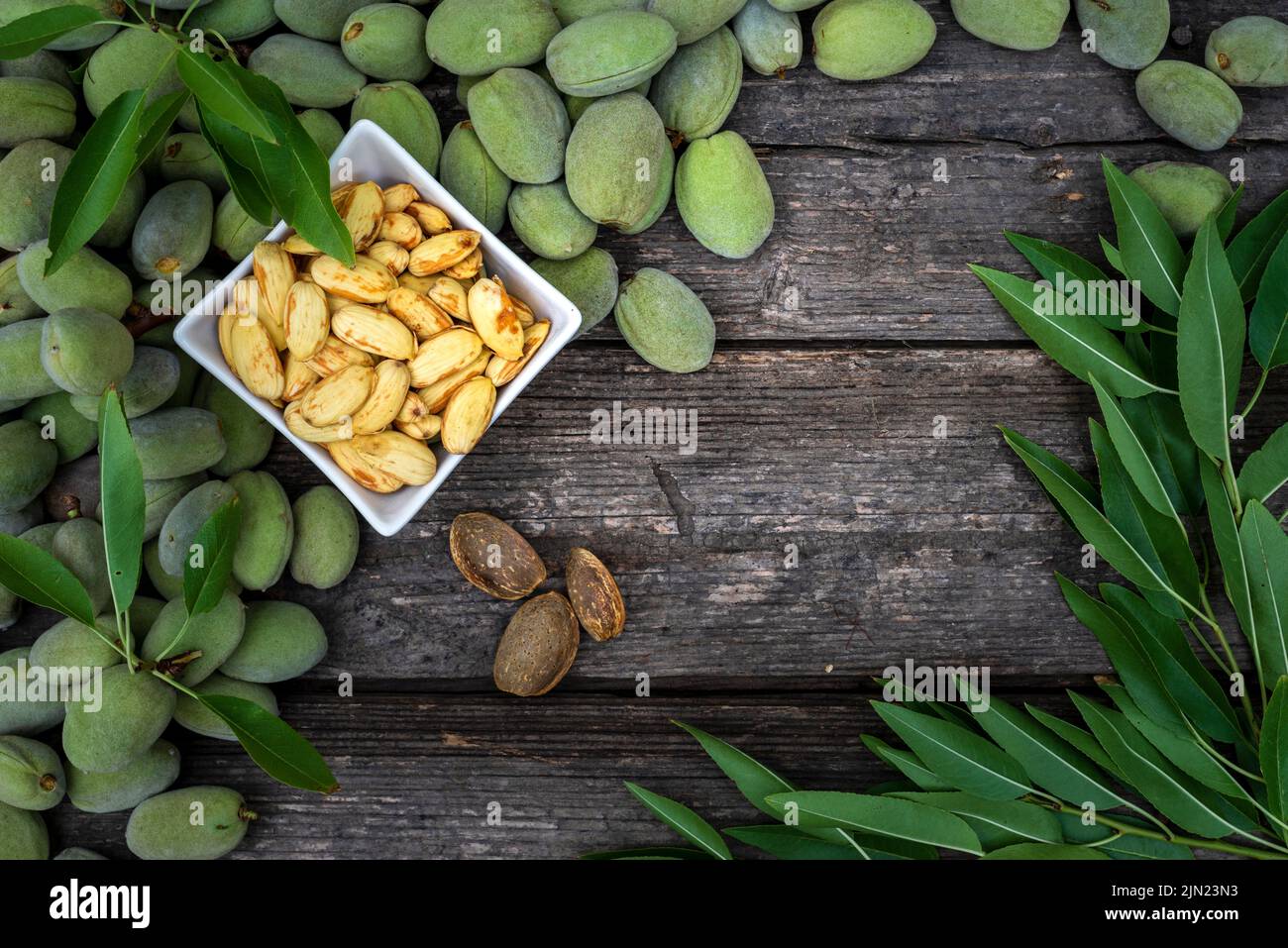 Green almonds open background fresh raw unripe wooden rustic table ...