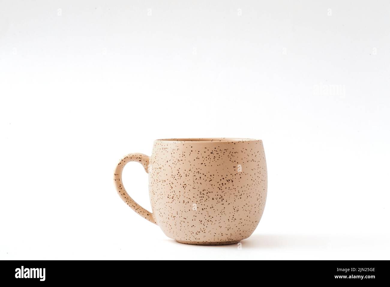 Empty beige coffee ceramic cup on isolated white background, cut out ...