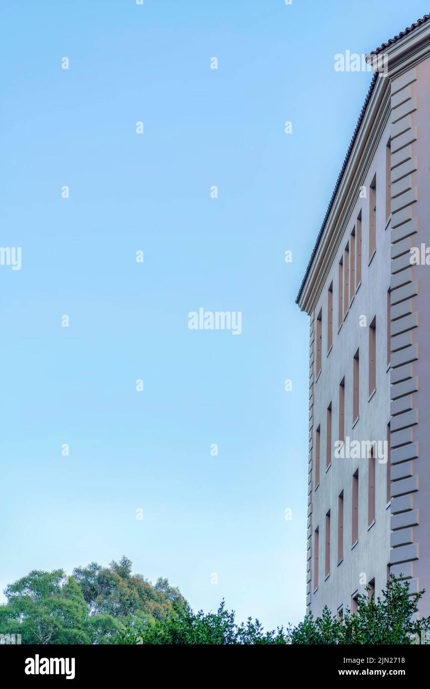 Side view of a georgian style building with stucco wall in San ...