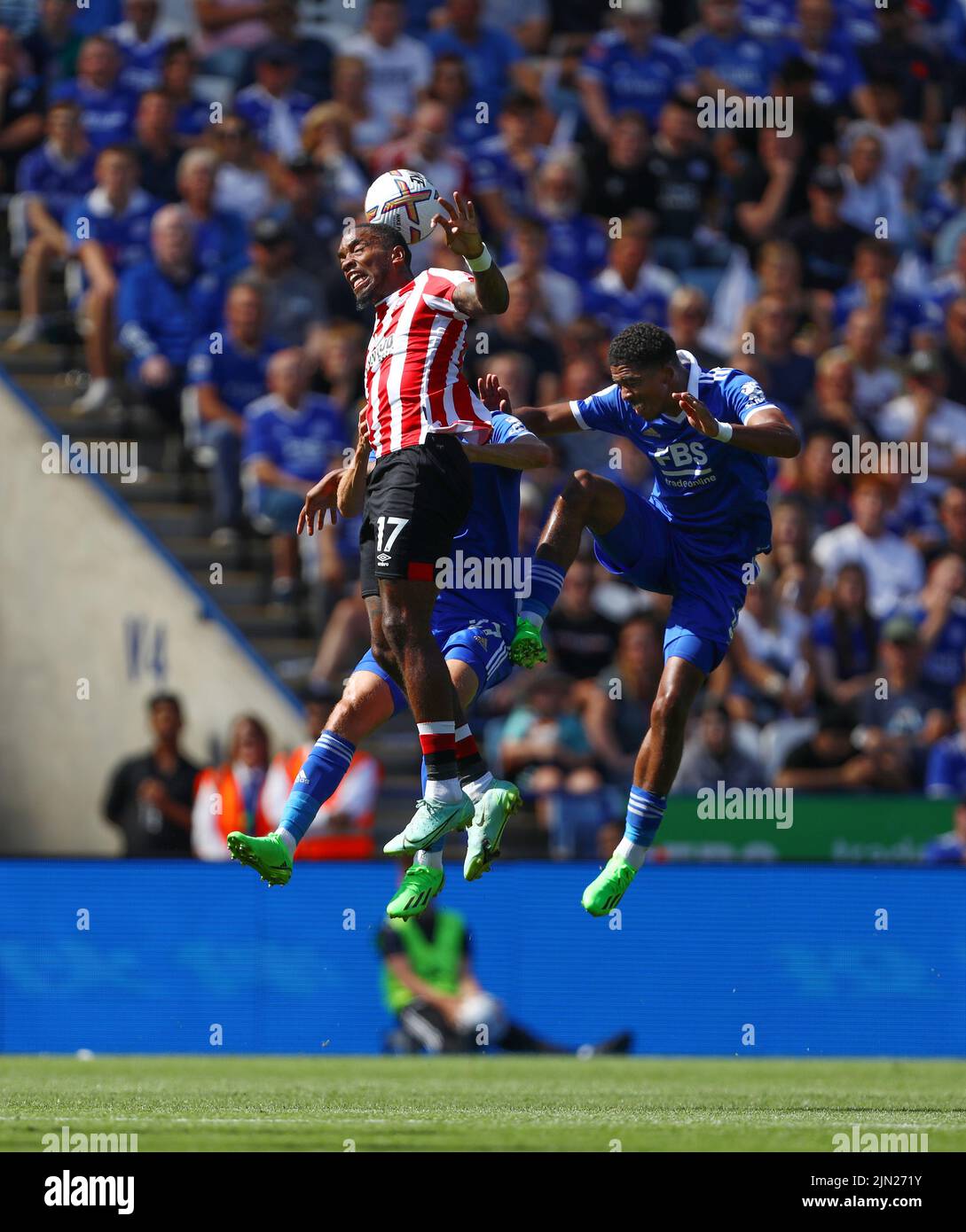 Ivan Toney of Brentford in action with Wesley Fofana and Timoty Castagne of Leicester City ...