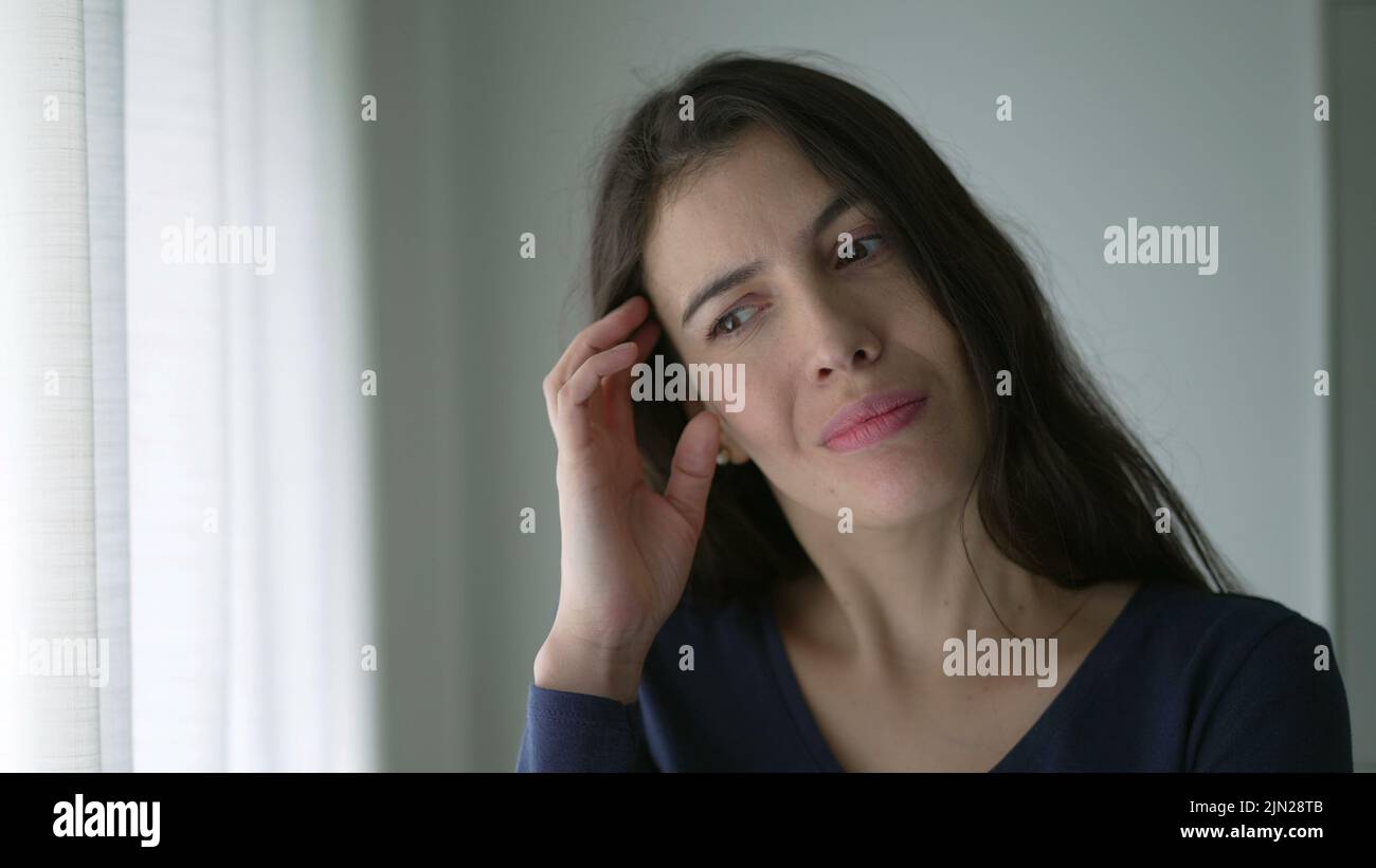 One confused woman thinking deeply about solution. Person in dilemma ...