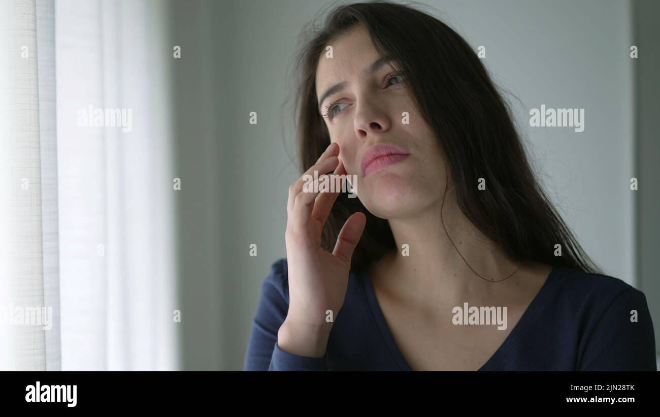 One confused woman thinking deeply about solution. Person in dilemma ...